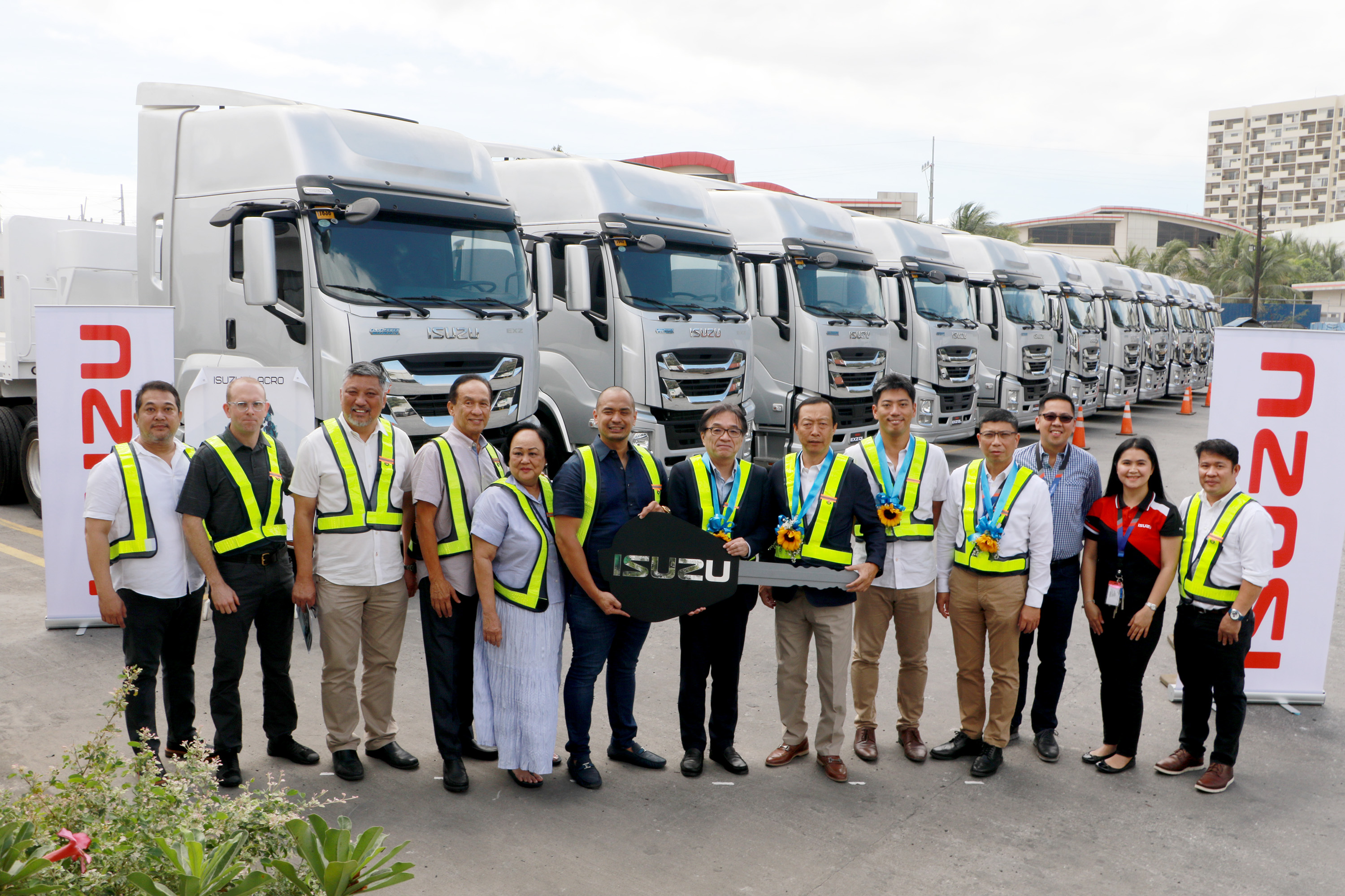 Isuzu Philippines turns over 11 EXZ QL trucks to Acro Transport and ...